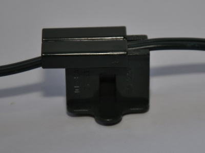 Slide the back cover firmly onto the wire . Make sure that the sloped ...