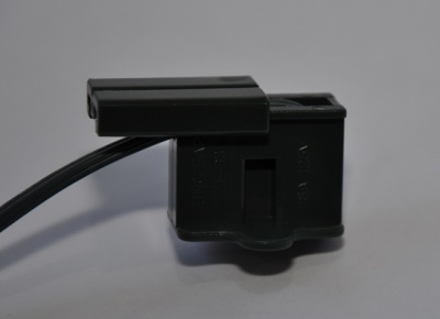 Slide the back cover firmly onto the wire . Make sure that the sloped ...